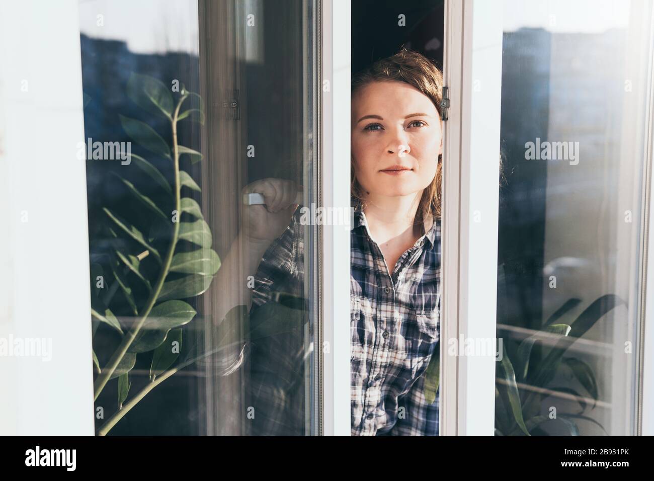 Ventilate woman window hi-res stock photography and images - Alamy