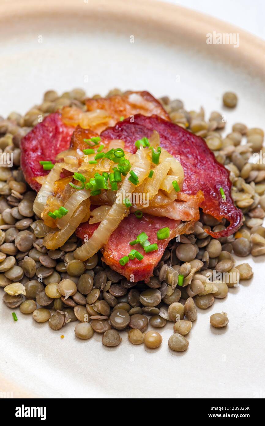 smoked meat with lentils and onion Stock Photo - Alamy