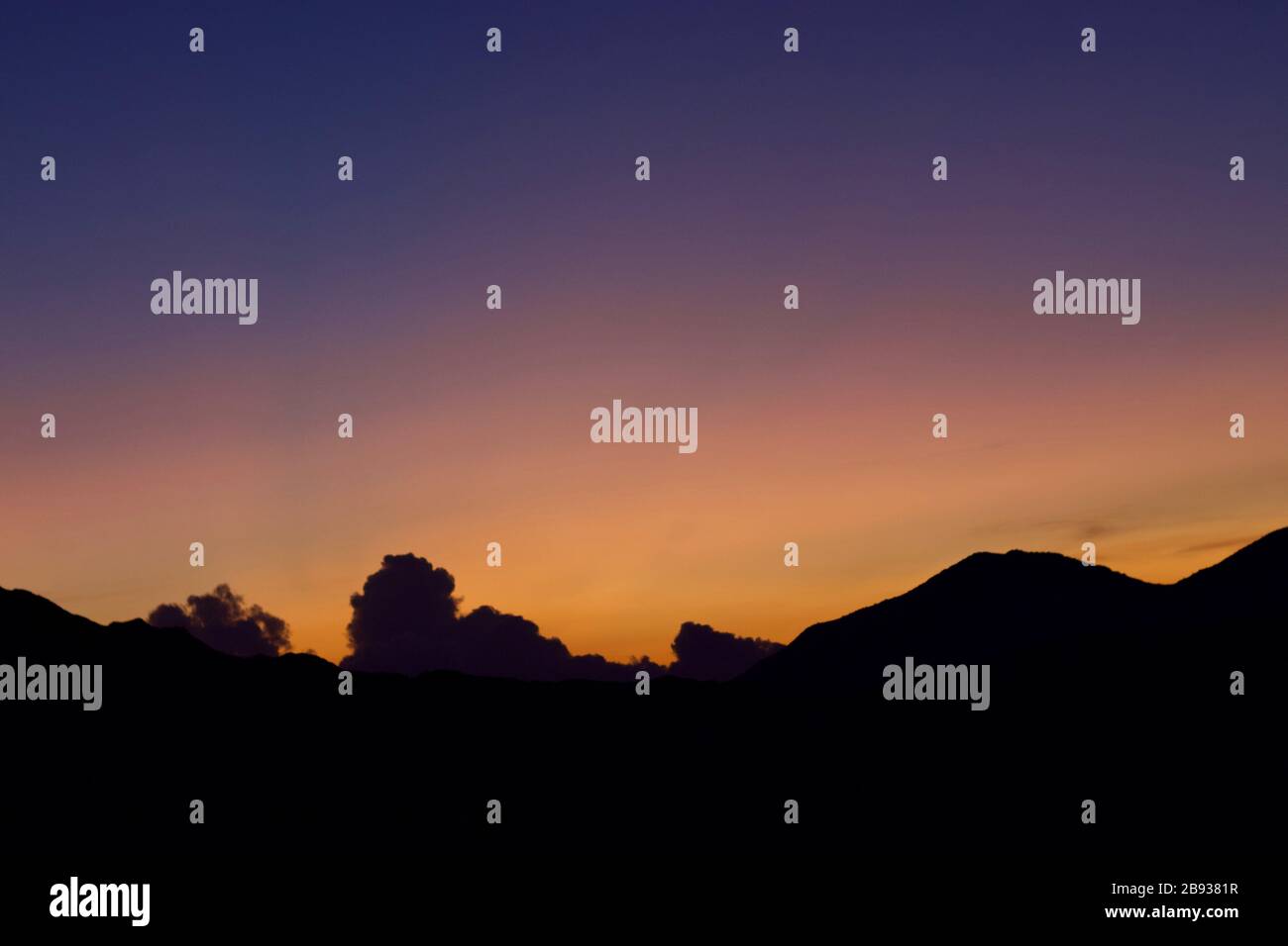 Mount Bromo Silhouettes at Sunset under purple Sky, Mount Bromo ...