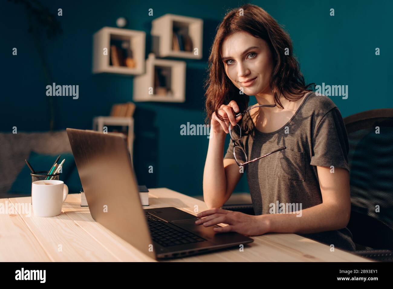Lady sitting at desk hi-res stock photography and images - Alamy