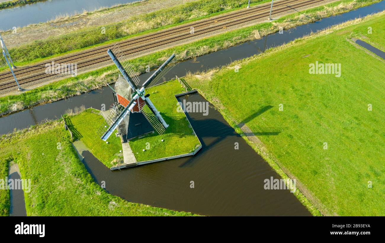 Aerial view of a old dutch traditional windmill on the rural ...