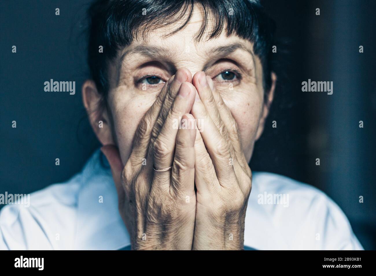 Sad depressed, stressed, thoughtful, senior, middle aged old woman ...