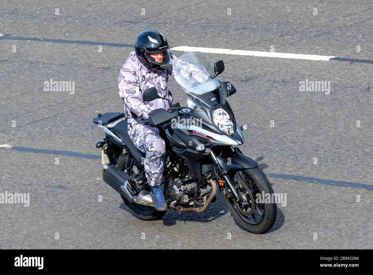 Givi V-strome motorbike rider; Vehicular traffic, two wheeled transport ...