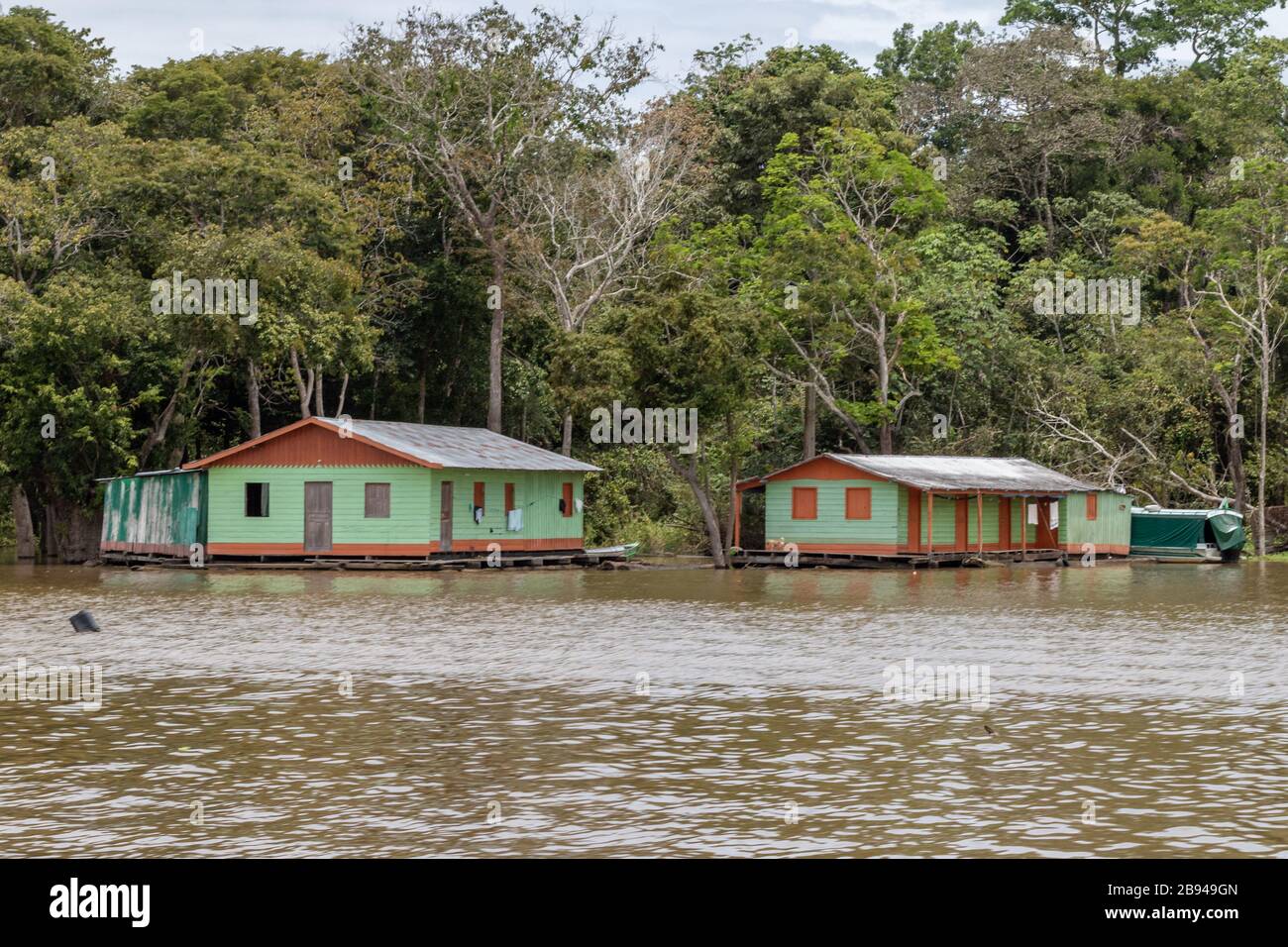 floating houses on the Amazon river in the city of Manaus in Brazil ...