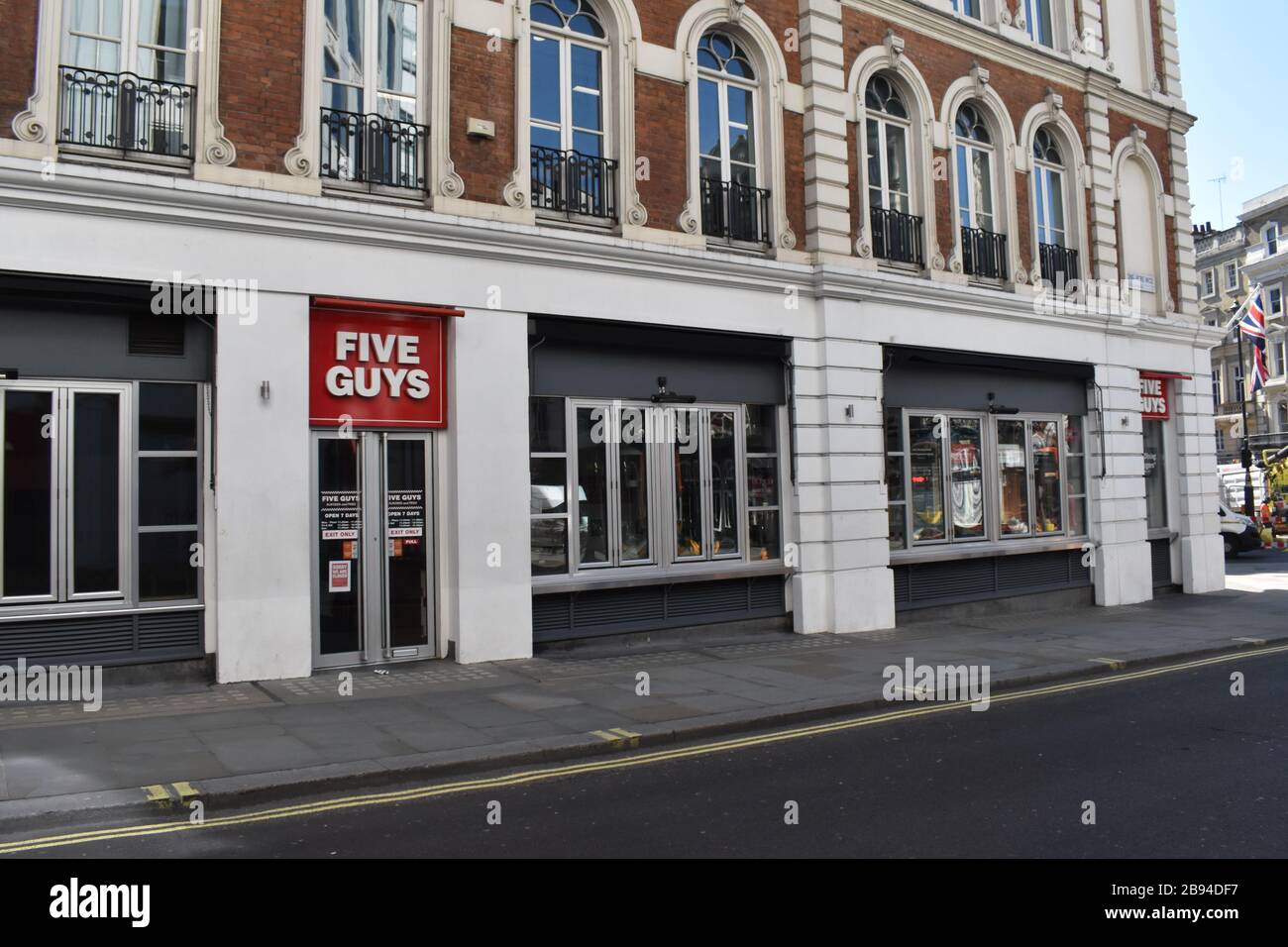 London, UK. 23rd Mar, 2020. Five Guys Covent Garden closed. Empty ...