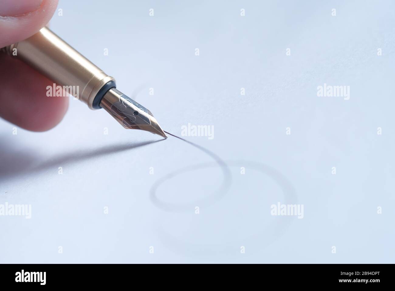 Man hand with fountain pen signature , close up Stock Photo - Alamy