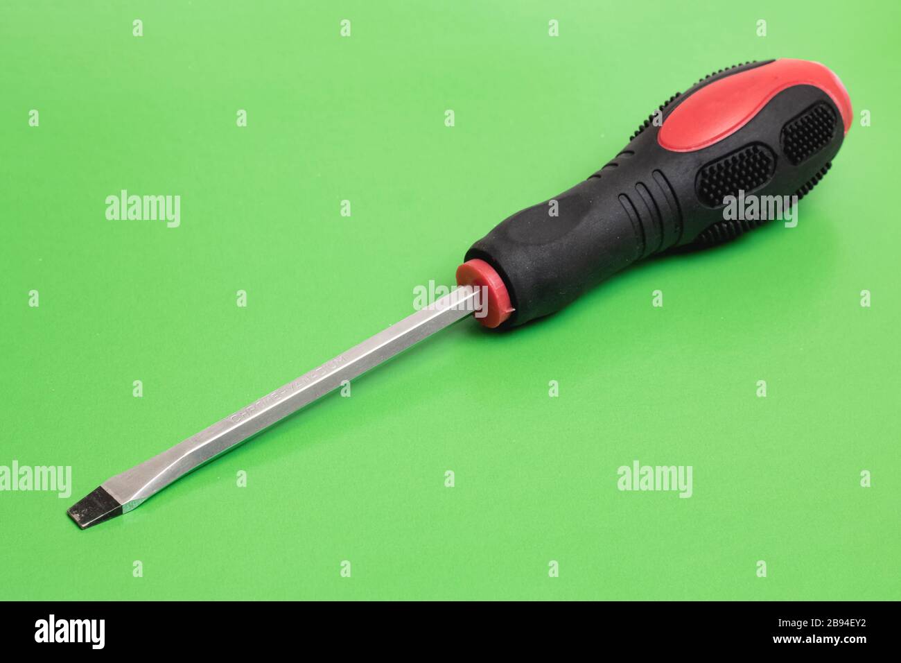 Screwdriver screw driver green plastic tool steel hi-res stock ...