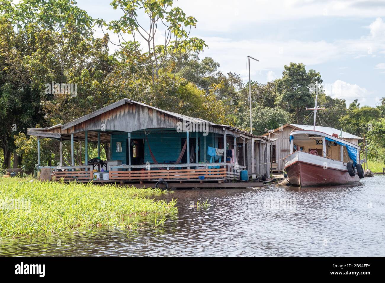 floating houses on the Amazon river in the city of Manaus in Brazil ...