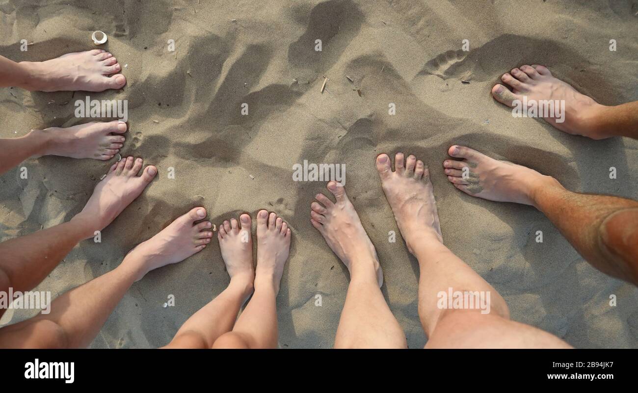 Legs feet five people on hi-res stock photography and images - Alamy