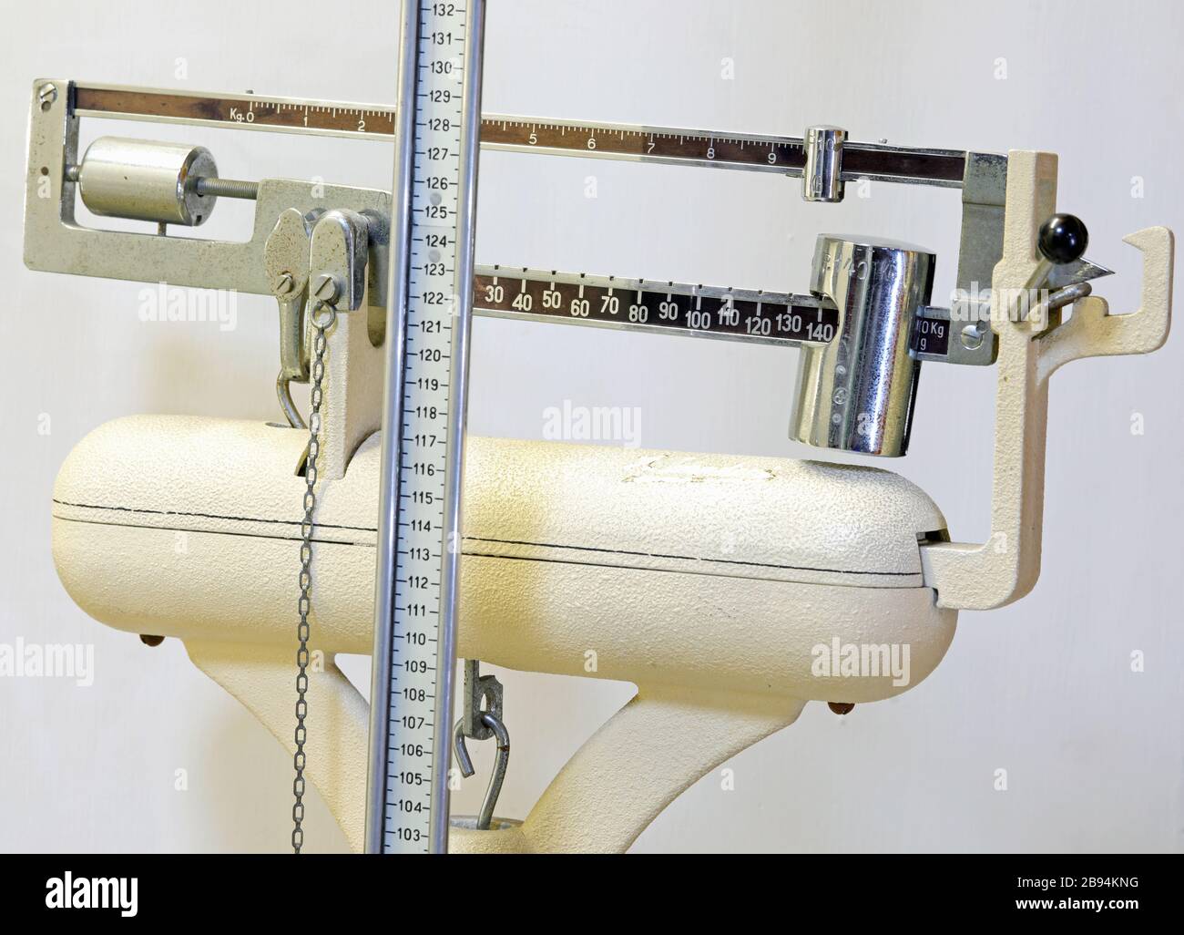 old scale with graduated rod for measuring the height and weight of ...