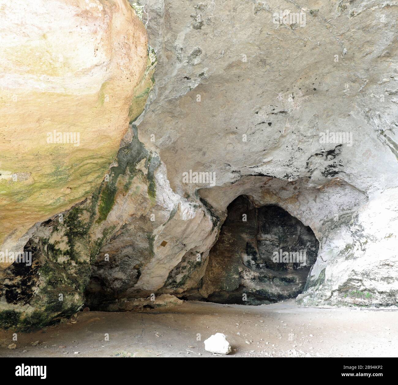 inside a wide cave used by primitive men as a refuge during prehistoric ...