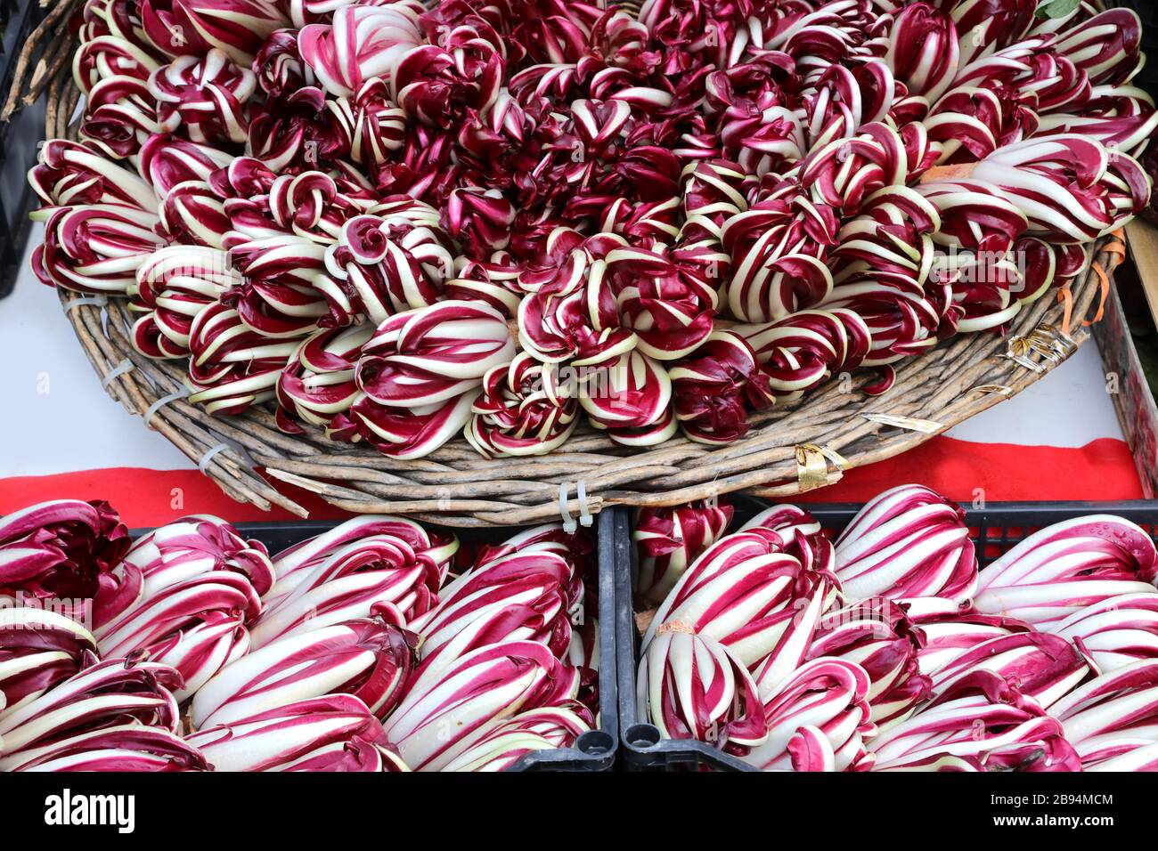 baskets full of Treviso red radicchio for sale at the fruit and ...