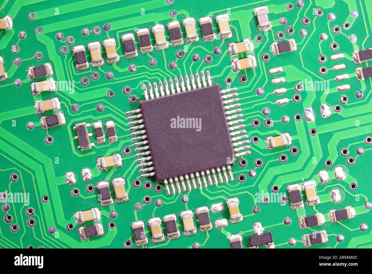 background of an electronic circuit with a microchip and other ...
