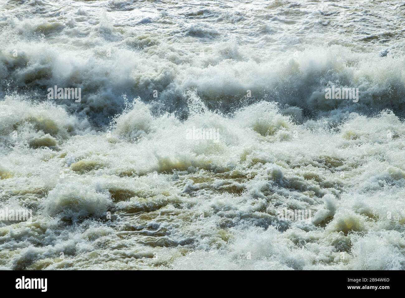 Splashing water waves on the spring fast river Stock Photo - Alamy