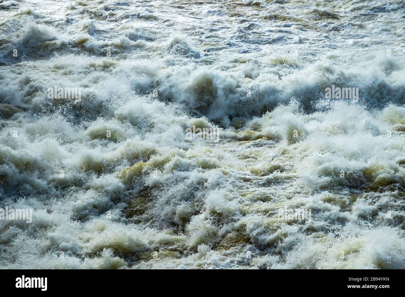 Splashing water waves on the spring fast river Stock Photo - Alamy