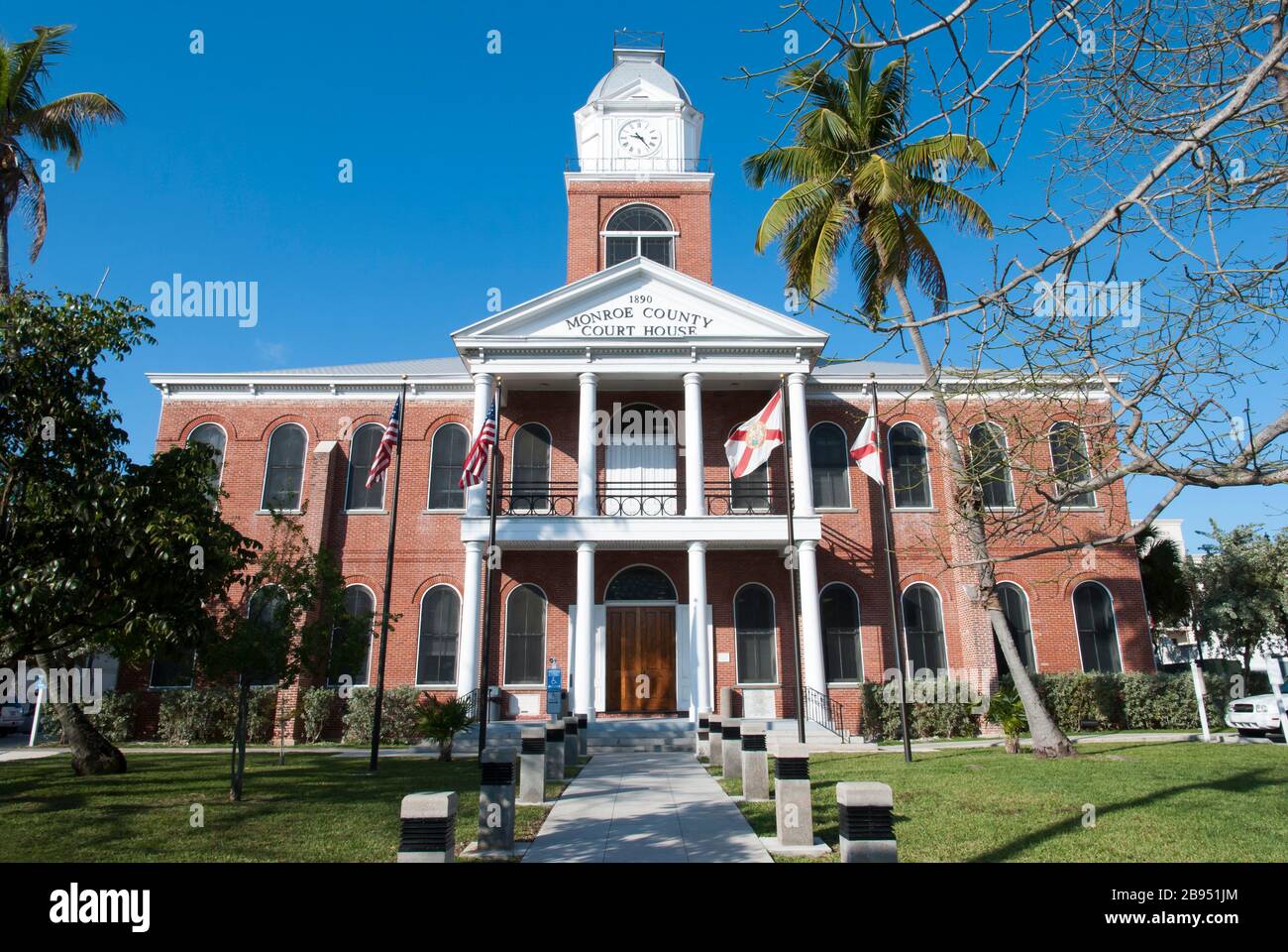 The facade of the historic 19th century court house in Key West ...