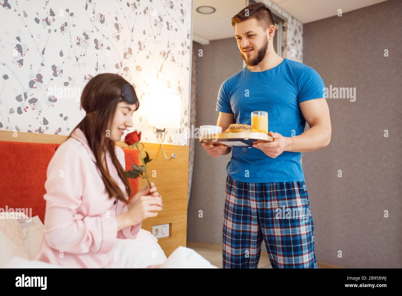 Romantic love couple, breakfast in bed at home Stock Photo - Alamy