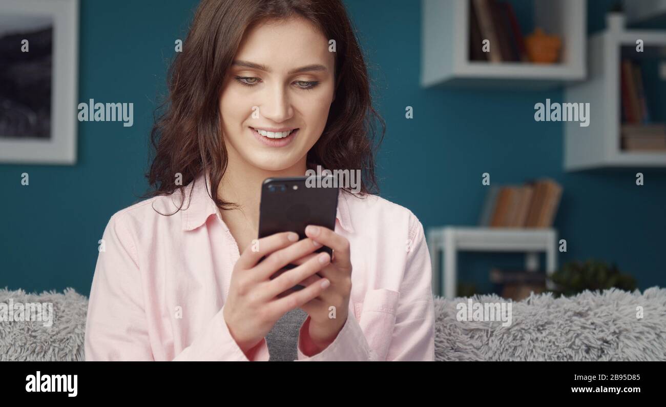 Female using cellphone portrait Stock Photo - Alamy