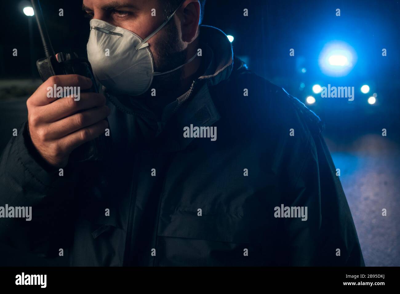 Police with surgical mask hi-res stock photography and images - Alamy