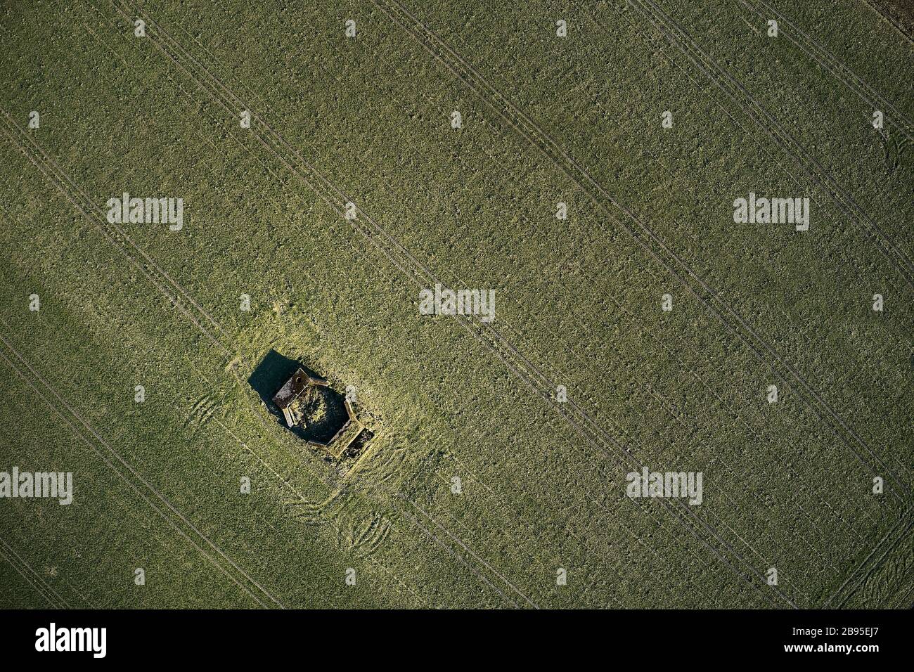 Aerial view of the remnants of an old ruined wartime anti aircraft gun ...