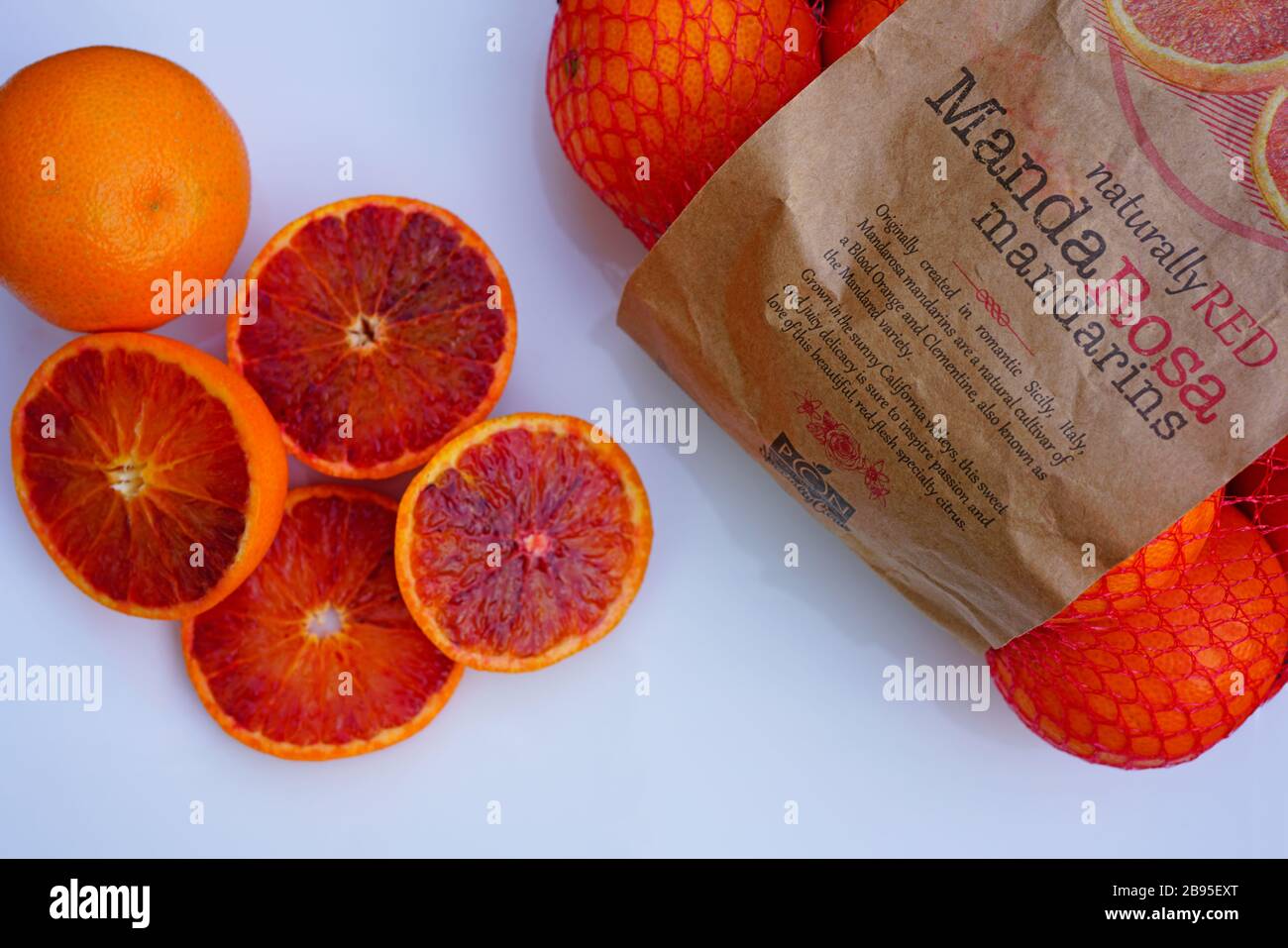 WEST WINDSOR, NJ -5 MAR 2020- Mandarosa red-fleshed red mandarins cut ...