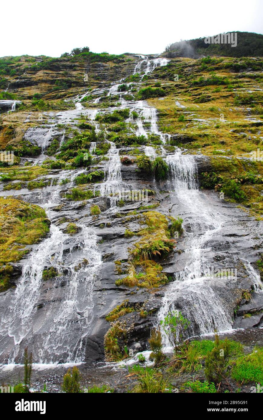 Waterfalls in Milford Sound, New Zealand Stock Photo - Alamy
