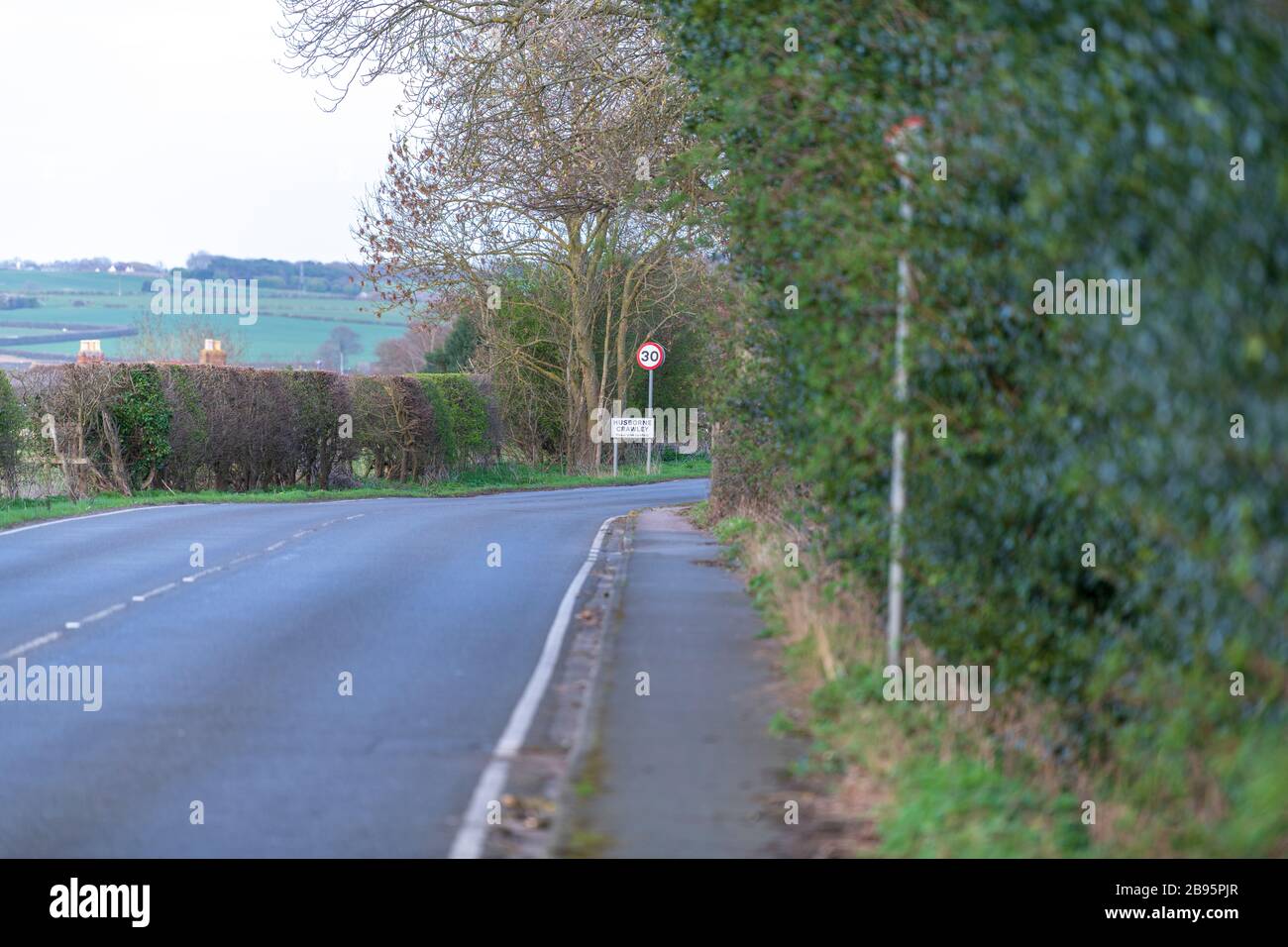 Empty road with speed limit sign in Aspley Guise, Milton Keynes Stock ...