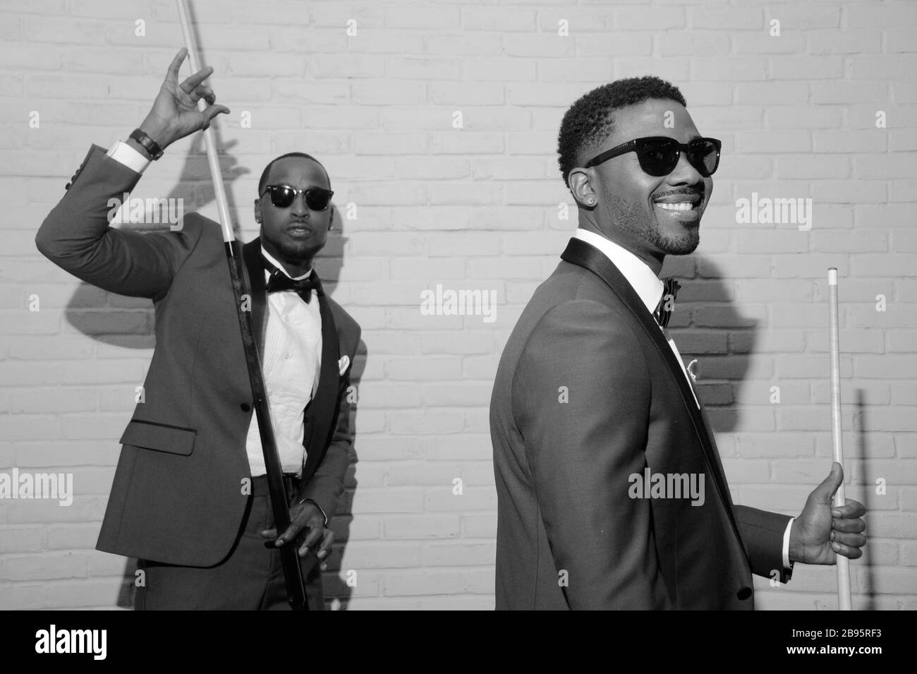 (L-R) Actor Jackie Long and Singer Ray J on set portrait of Ray J music ...