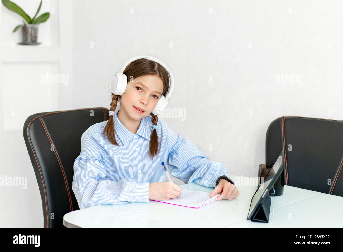 Young girl learn by tablet at home. Distance learning in quarantine ...