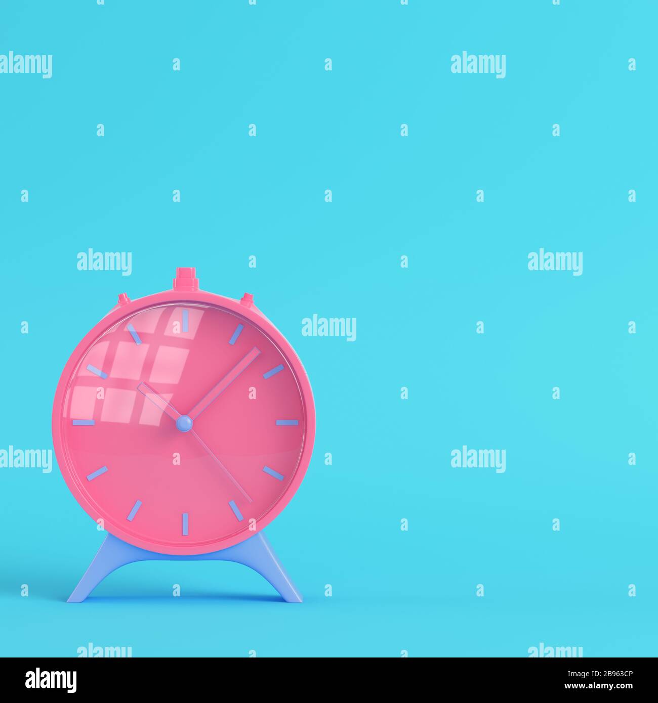 Retro alarm clock on bright blue background in pastel colors ...