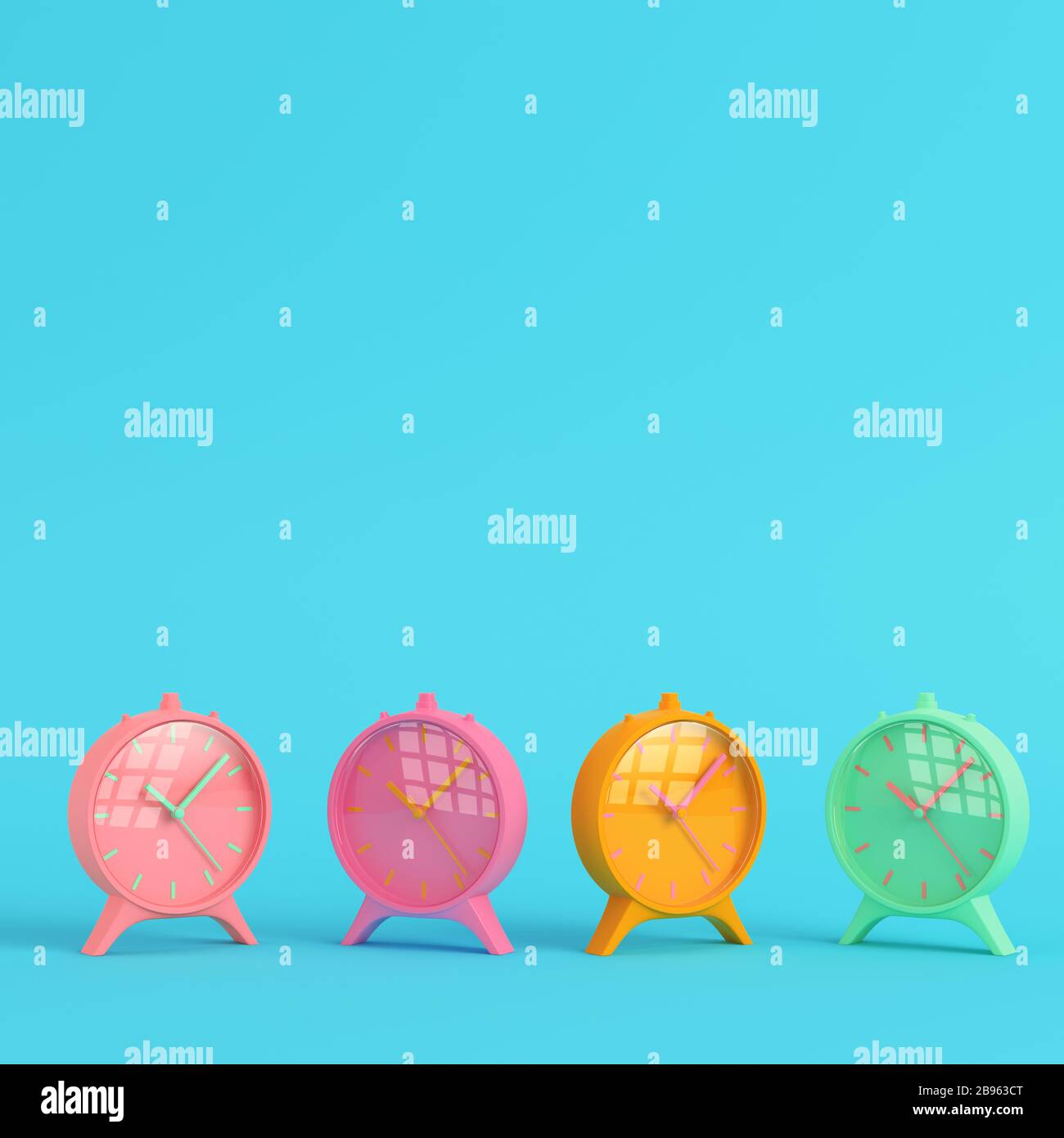 Four colorful retro alarm clocks on bright blue background in pastel ...