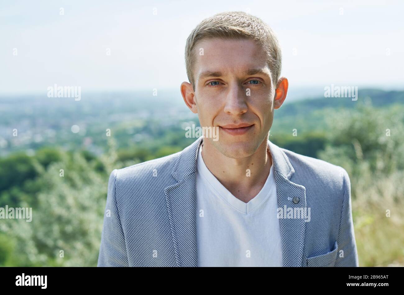 Portrait of serious young businessman Stock Photo - Alamy