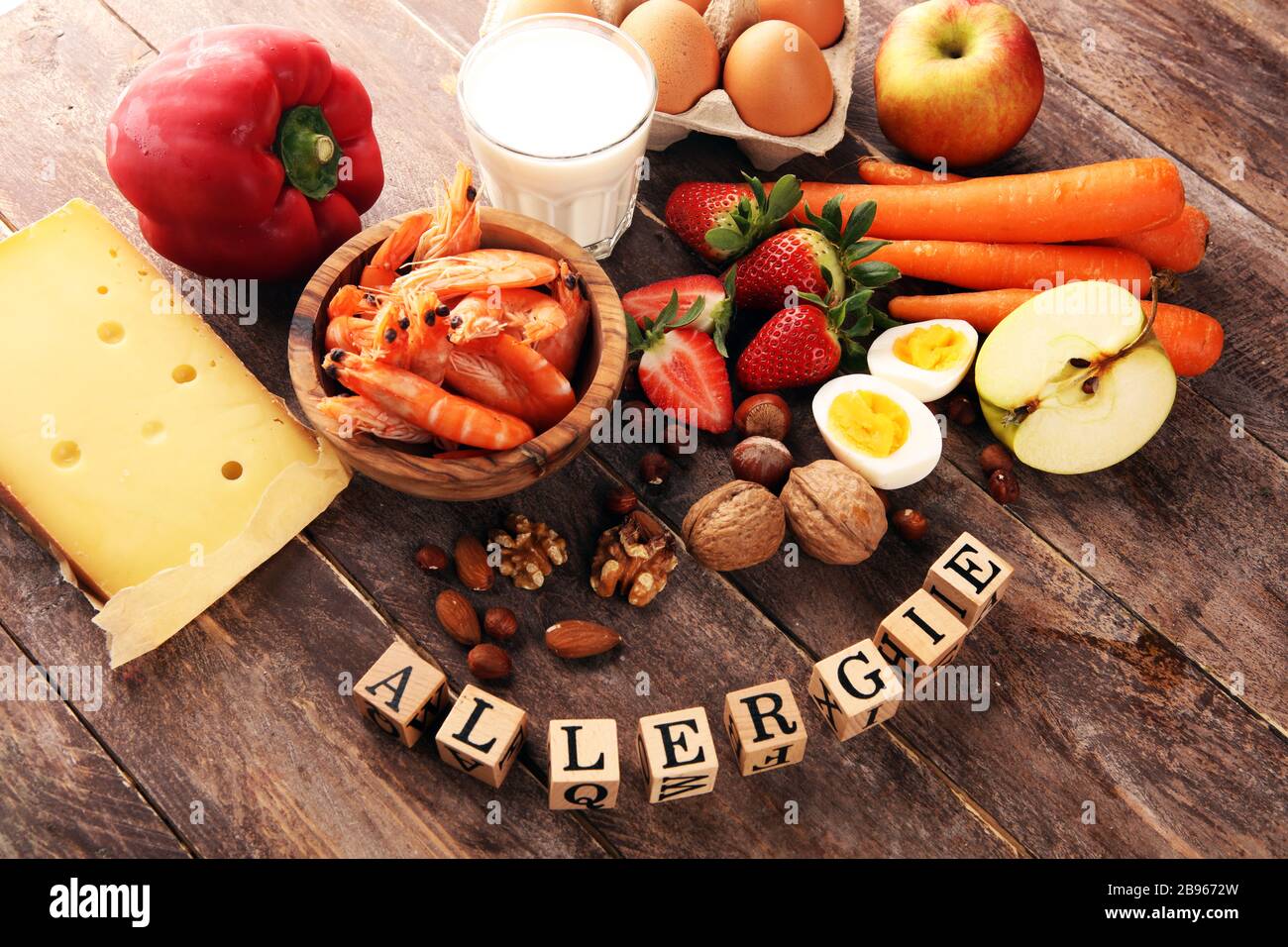 Allergy food concept. Allergy food as almonds, milk, cheese, strawberry ...