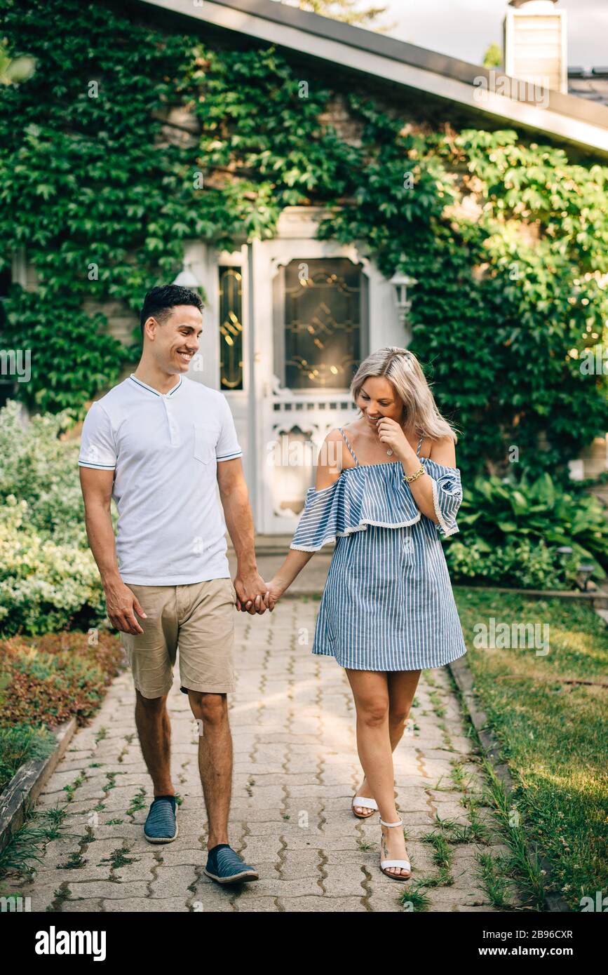 Hand in hand outside hi-res stock photography and images - Alamy