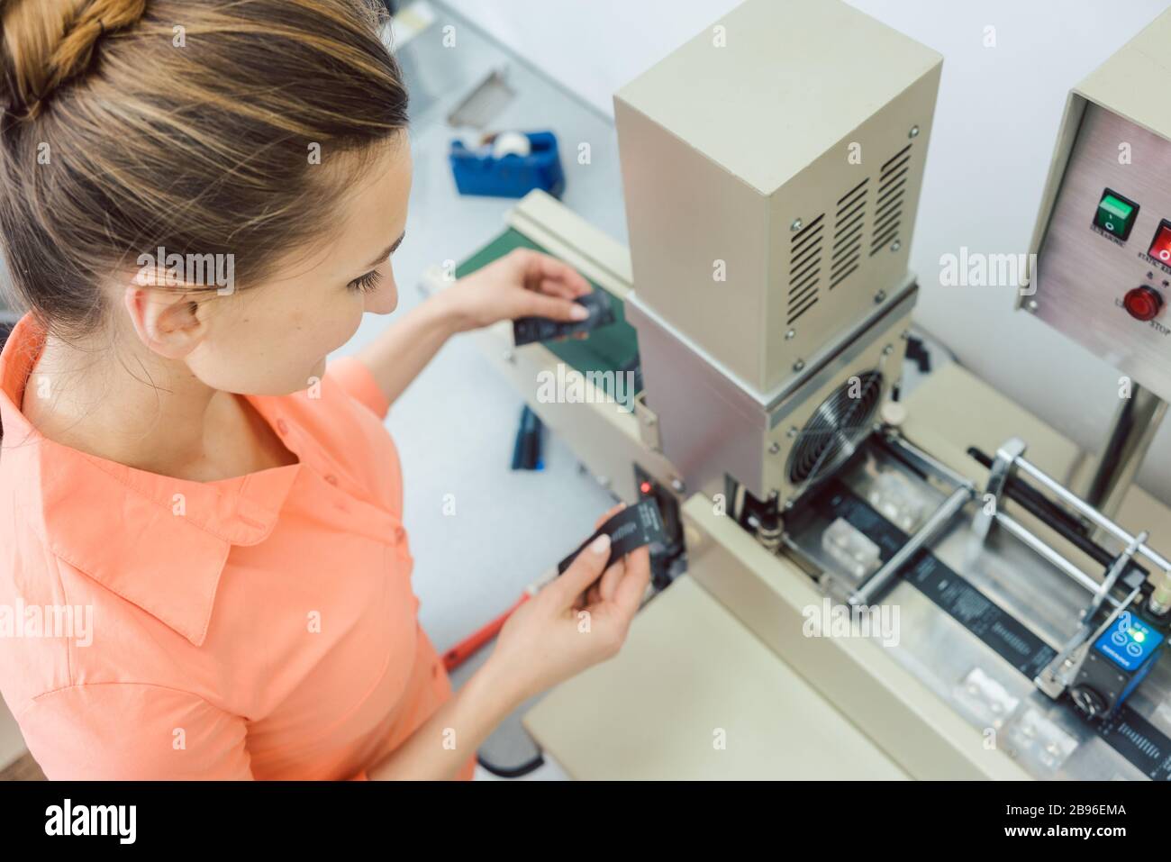 Worker checking label machine hi-res stock photography and images - Alamy