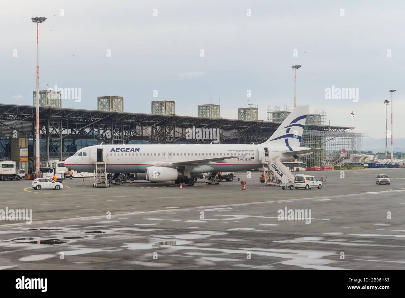 Aegean airlines aircraft grounded at airport tarmac. Greek flag carrier ...