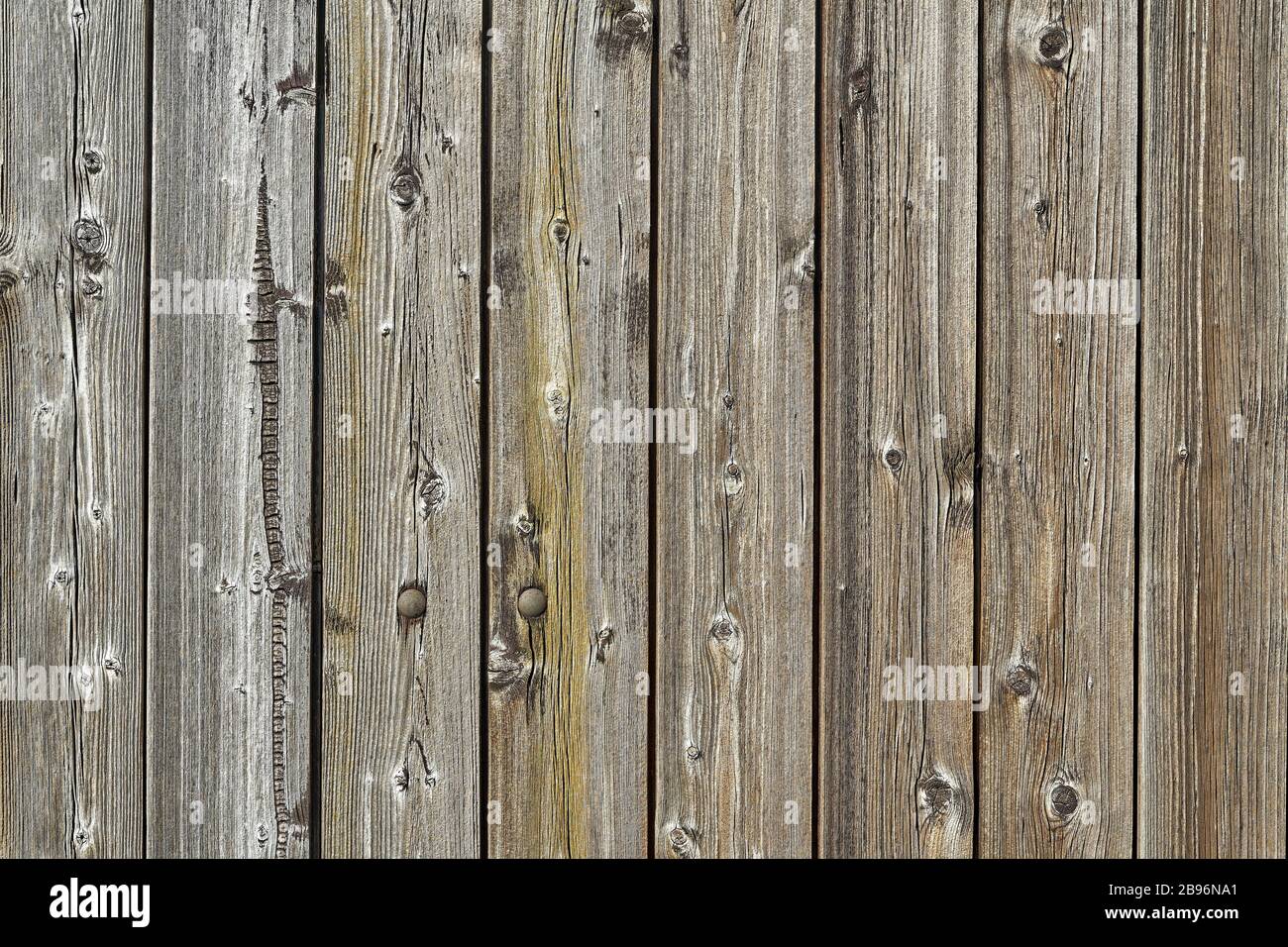 Timber wood wall of an old barn. Beautiful weathered vertical planks ...