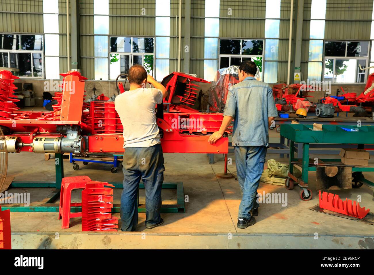 The workers work in the workshop of the factory Stock Photo - Alamy