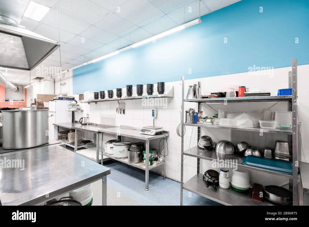 Work surface and kitchen equipment in professional kitchen. Cooking ...