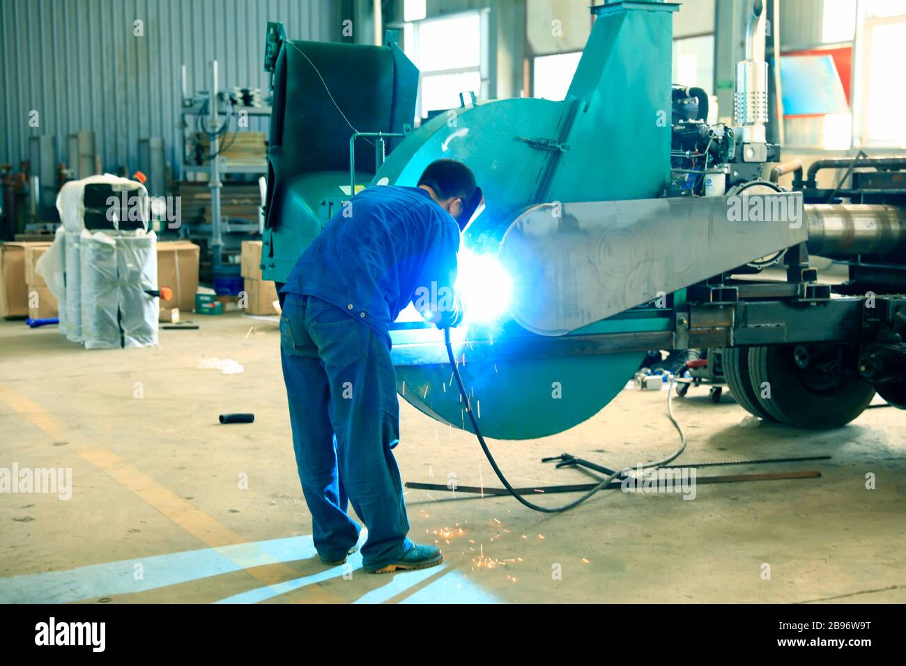 Welders work in factory workshops Stock Photo - Alamy