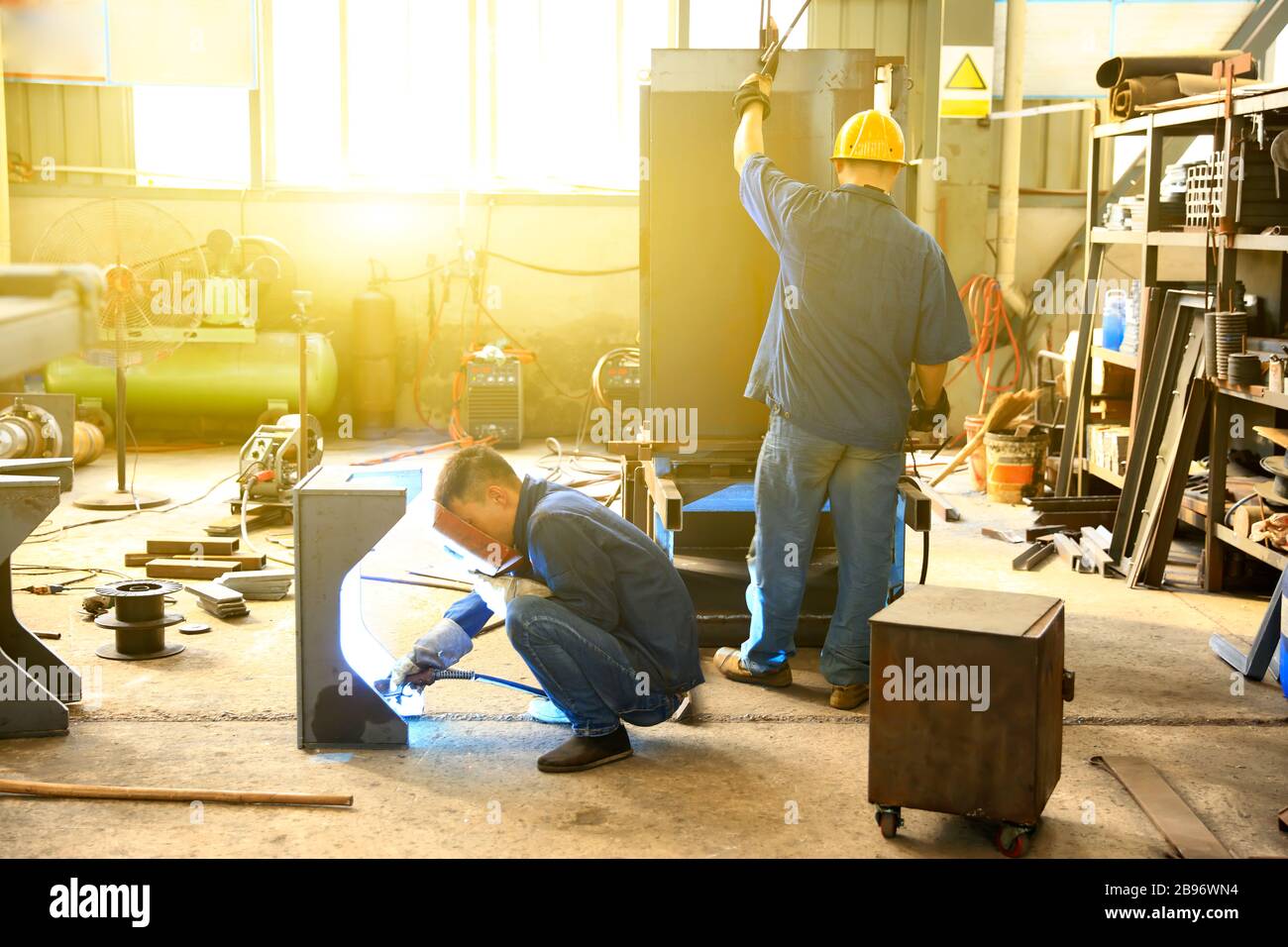 Welders work in factory workshops Stock Photo - Alamy