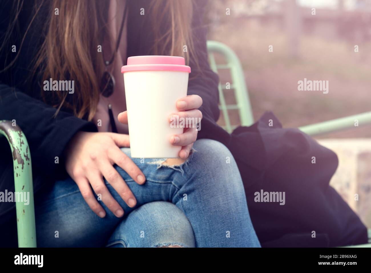 Female hands hold reusable coffee mug.Sustainable lifestyle concept ...