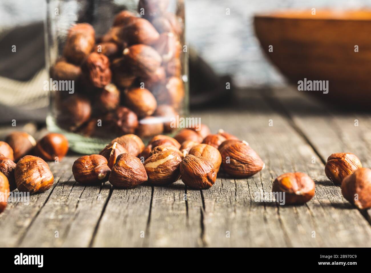 Peeled hazelnuts on old hi-res stock photography and images - Alamy
