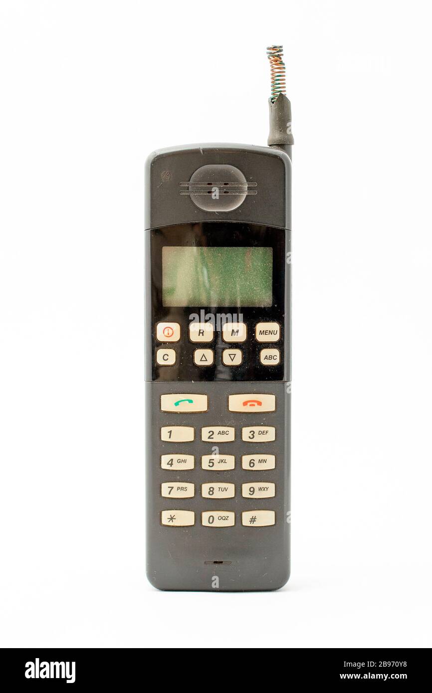 Old mobile phone on white background Stock Photo - Alamy