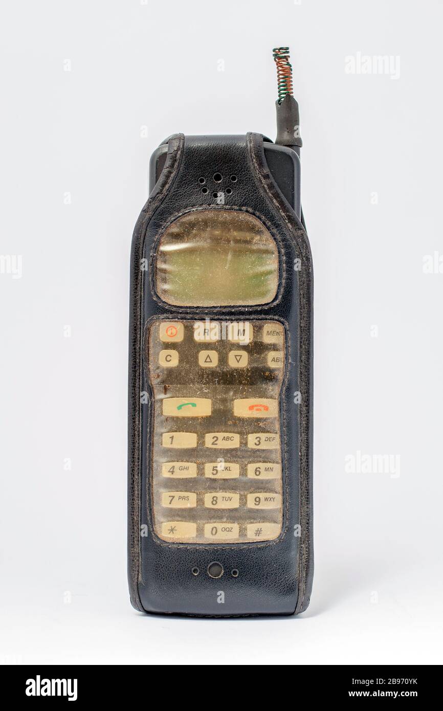 Old mobile phone on white background Stock Photo - Alamy