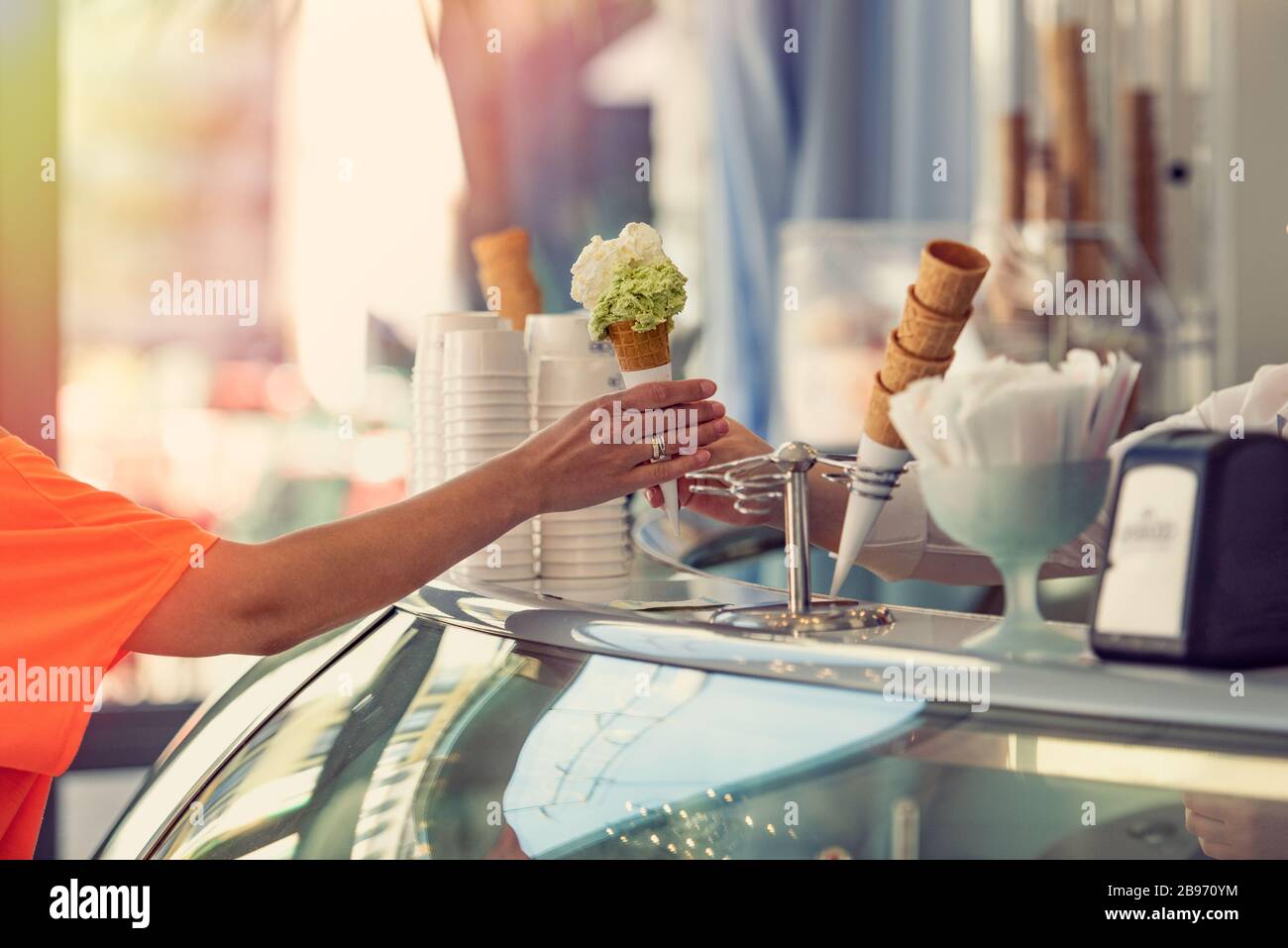Woman preparing ice cream hi-res stock photography and images - Alamy
