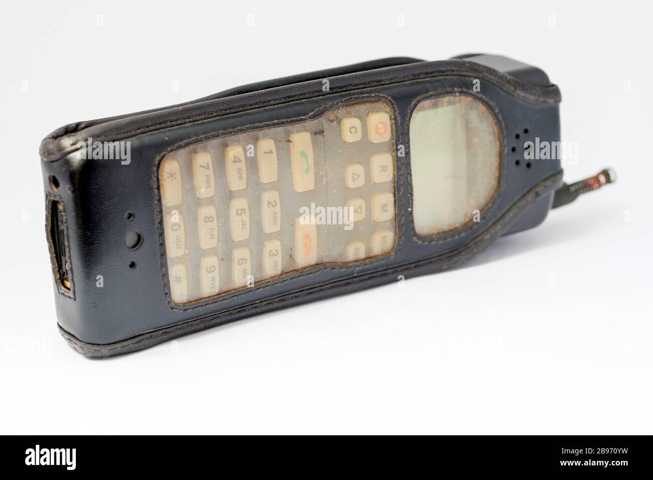 Old mobile phone on white background Stock Photo - Alamy