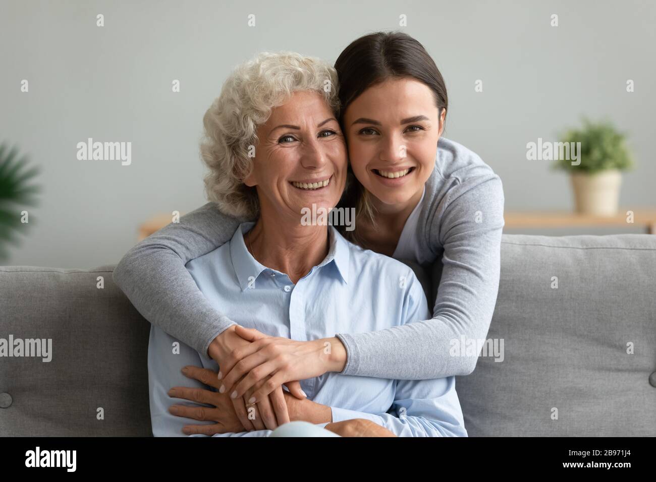 Happy senior mother and grownup daughter posing for picture Stock Photo - Alamy