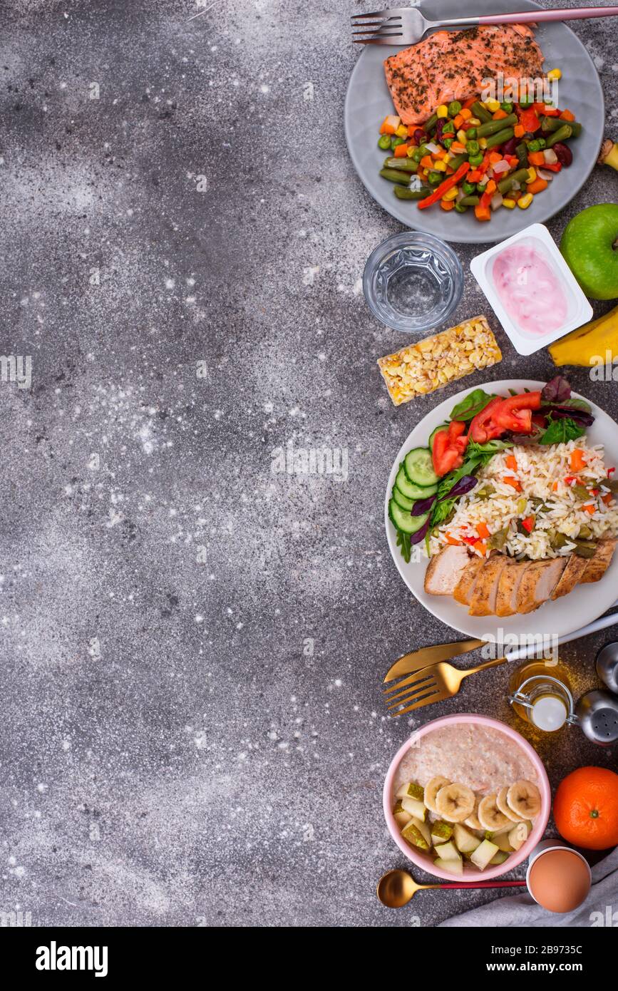 Breakfast, lunch and dinner. Balanced menu Stock Photo - Alamy