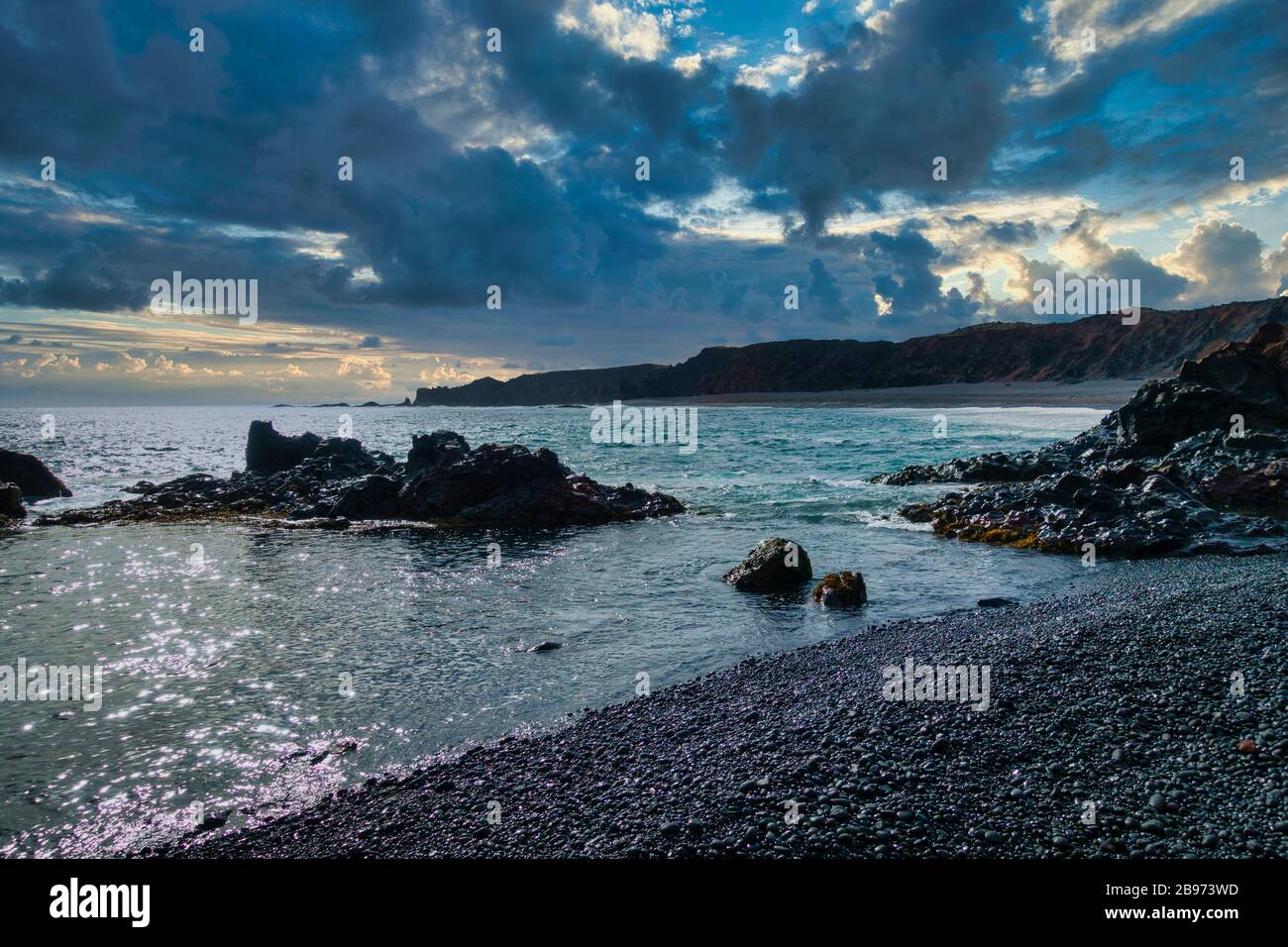 Black rocky beach on Snaefellsnes peninsula, Iceland. Dramatic cloudy ...
